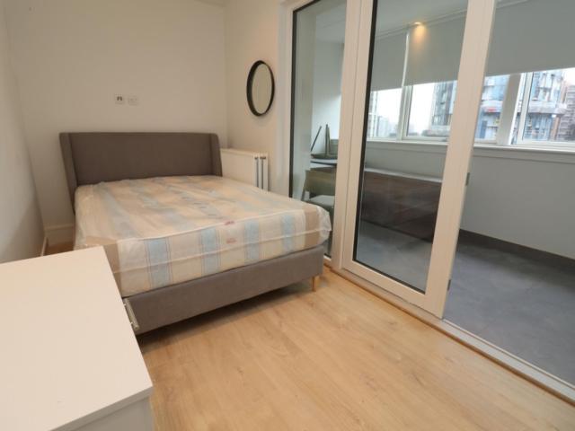Tasteful double bedroom in Wembley Has a Room