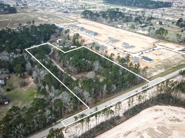 Tbd 6.77 acres Goodman, Conroe, TX 77306 | MLS #73980