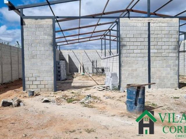 TERRENO NA PAMPULHA COM DOIS GALPÕES INACABADOS