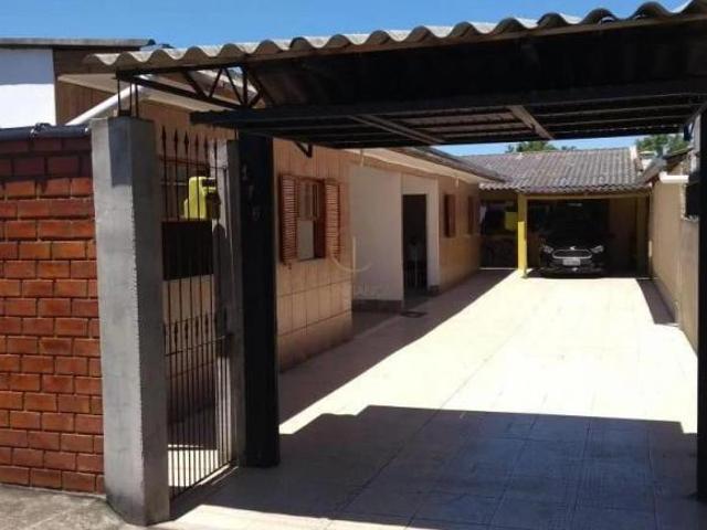 Terreno no Niterói com três casas para locação