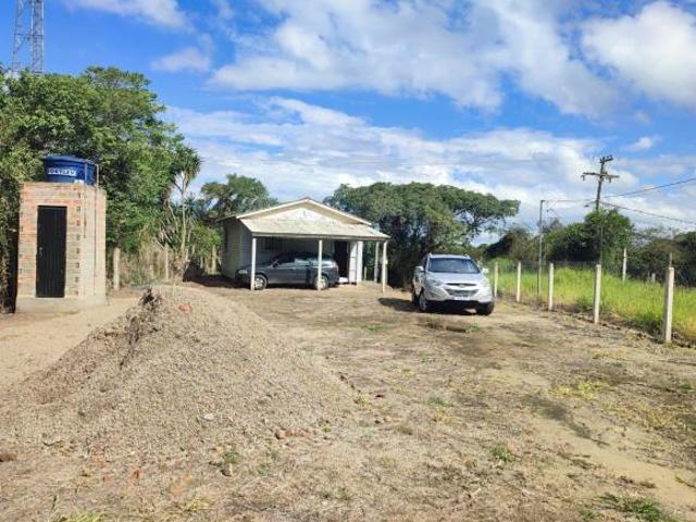 Terreno no bairro Lageado com 2 casas de 1 dormitório