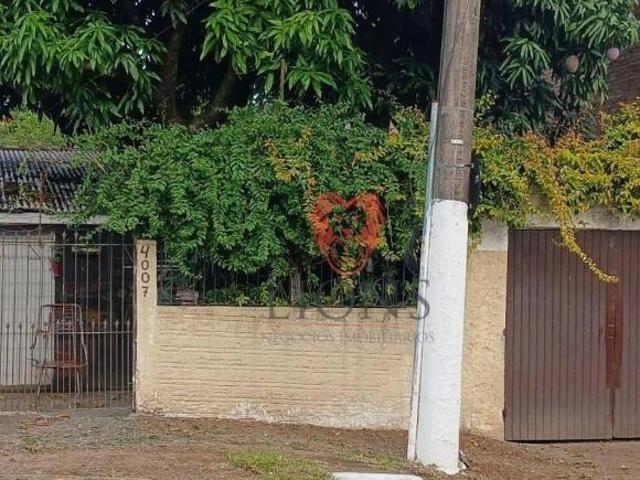 Terreno à venda, 320 m² por R$ 450.000,00 Centro Gravataí/RS