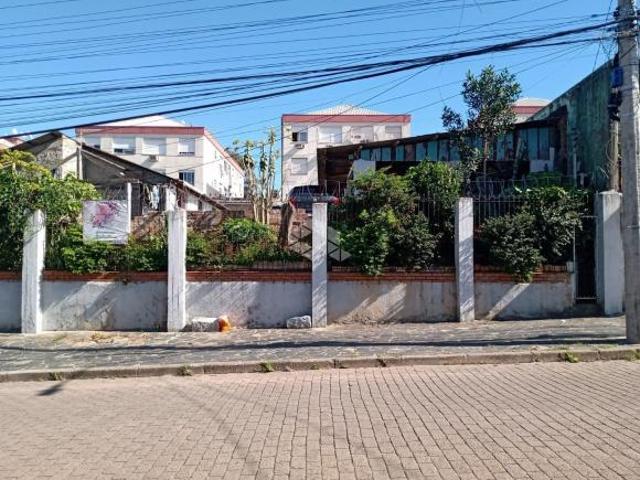 Terreno à venda, com casas e estacionamento, Rubem Berta