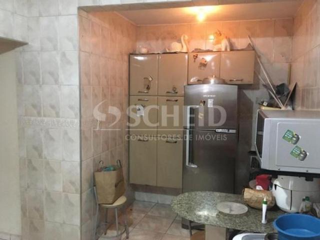 Terreno à Venda com 250 m² e 5 Casas Construídas