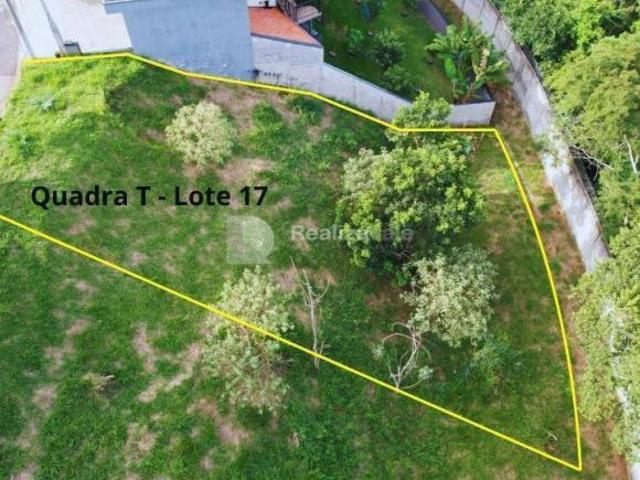 Terreno à venda Cataguá Way Norte com 464.24 m², topografia declive