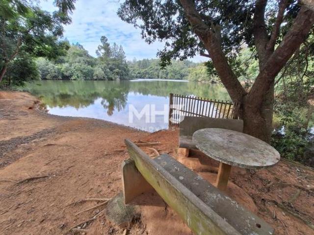 Terreno à venda, cerca de 1.593m², declive no Cond. Morada das Nascentes, Joaqui