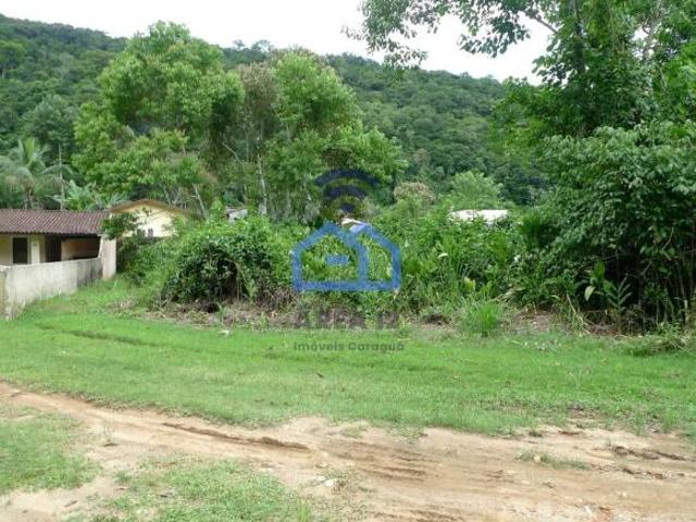 Terreno à venda no Condomínio Recanto Verde Mar, no bairro do Massaguaçu, em Caraguatatuba, SP