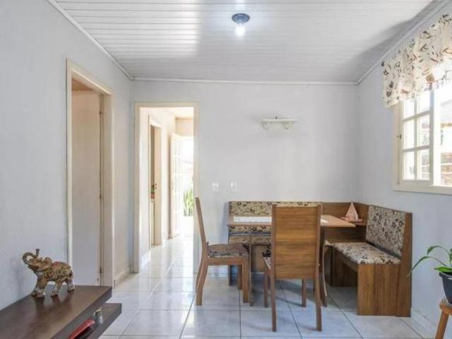 Terreno com 4 Casas no Bairro Campo Novo