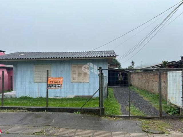 Terreno com 4 casas alugadas no bairro Alvorada