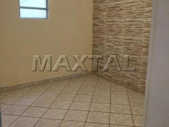 Terreno com 4 casas alugadas, com 330m², terreno em declive, 15,50 m de frente
