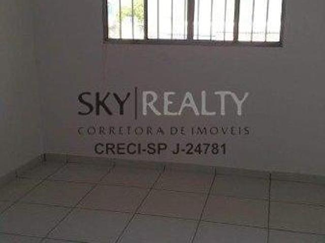 Terreno com 4 casas construidas renda a venda