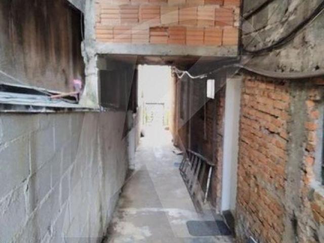 Terreno com 4 casas para renda, 2 vagas de garagem Mandaqui