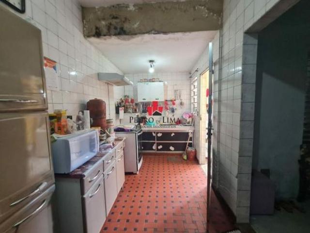 Terreno com 4 casas 4 vagas no Tatuapé