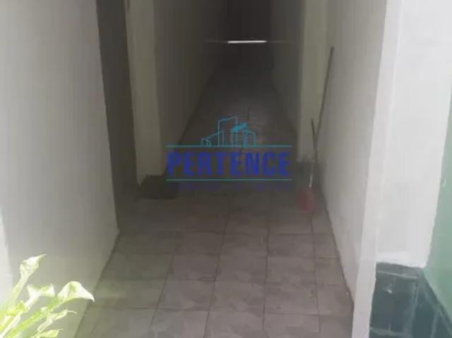 Terreno com 5 moradias e 4 lojas Bairro União