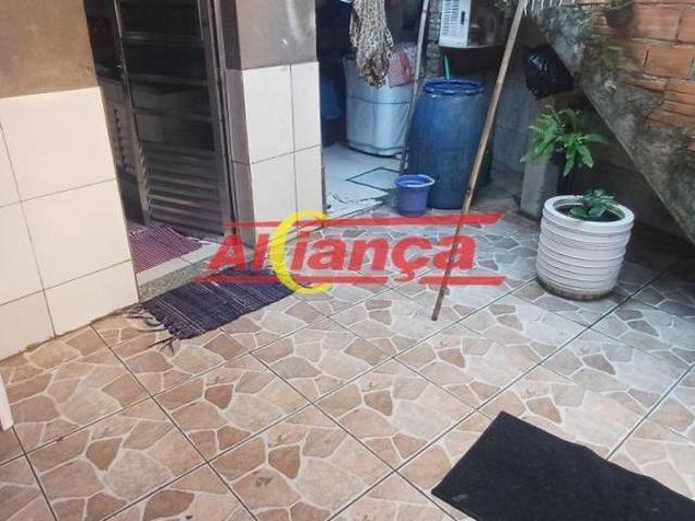 TERRENO COM 5 CASAS A VENDA
