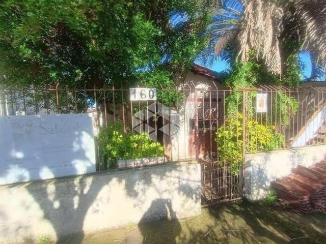 Terreno com 5 casas para investimento no Bairro Jardim Itu Sabará