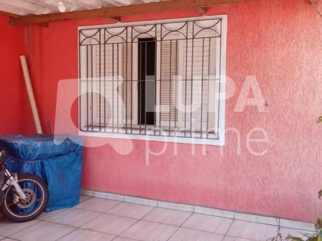 Terreno com 6 casas para renda à venda na Vila Ede!