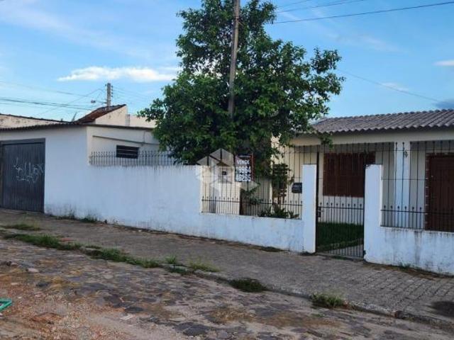 Terreno com 03 casas a venda no bairro Tancredo Neves