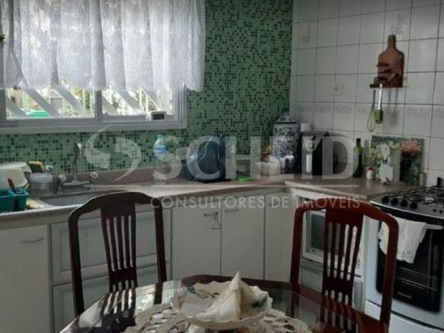 Terreno com 03 imóveis Comercial ou residencial 03 vagas