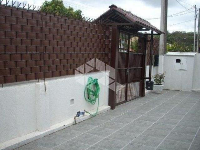 Terreno com 02 casas alvenaria