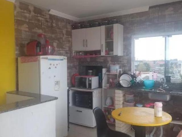 Terreno com 02 casas em Tramandaí