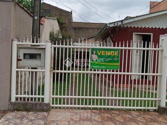 TERRENO COM 02 CASAS MV1