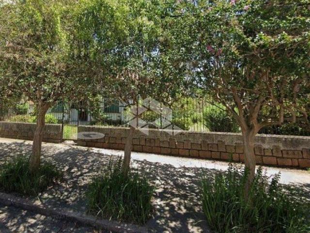 TERRENO COM 1000m² E CASA 4 DORMITÓRIOS