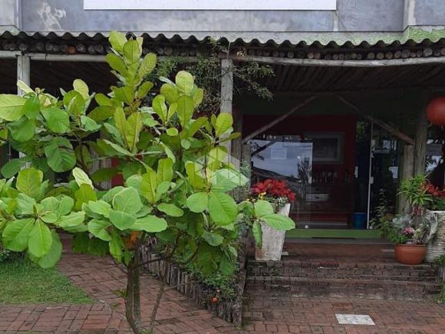 Terreno com 11,70x26m2 de fundos com Restaurante e Pousada em funcionamento