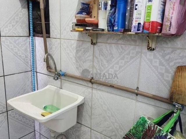 Terreno com 2 casas antigas