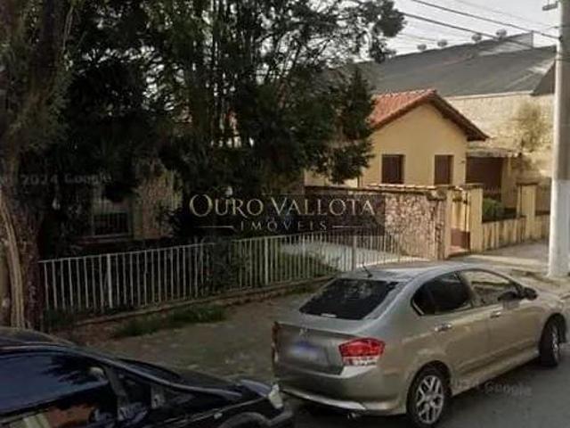 Terreno com 2 casas Antigas