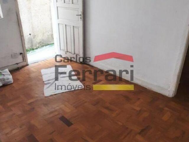 TERRENO COM 2 CASAS COM 1 DORMITÓRIO CADA E AMPLO QUINTAL