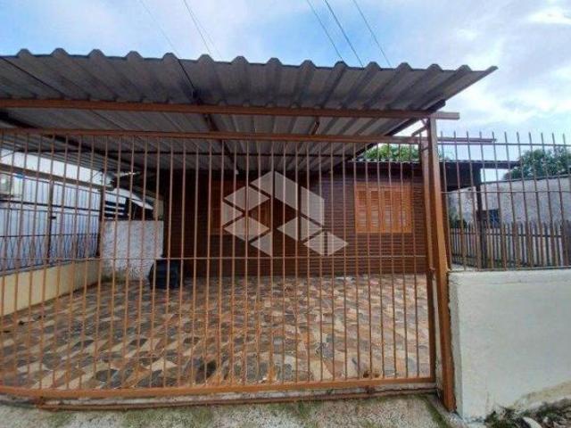 Terreno com 2 casas de madeira com 60,00m² de área construída cada uma em Niterói Canoas