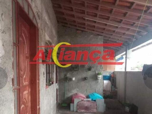 Terreno com 2 casas e lazer