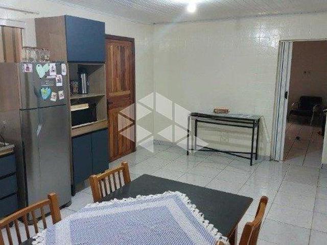 Terreno com 2 casas e uma edícula a venda no bairro São José em Canoas