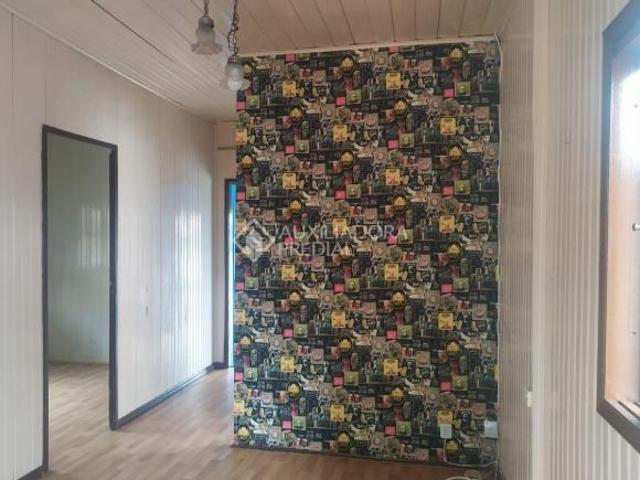 Terreno com 2 casas