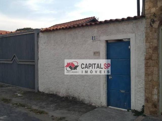 Terreno com 2 casas