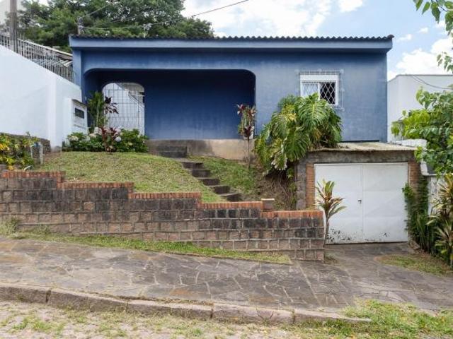 Terreno com 2 casas, 4 quartos, 1 suite Bairro Cavalhada