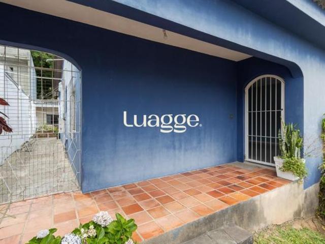 Terreno com 2 casas, 4 quartos, 1 suite Bairro Cavalhada