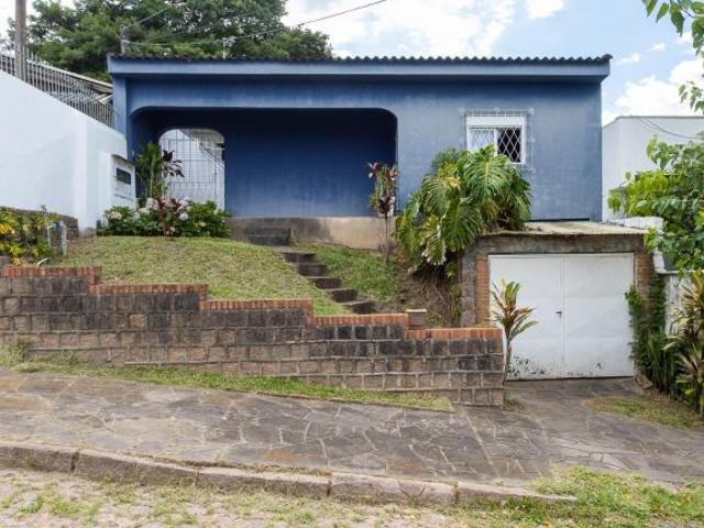 Terreno com 2 casas, 4 quartos, 1 suite Bairro Cavalhada