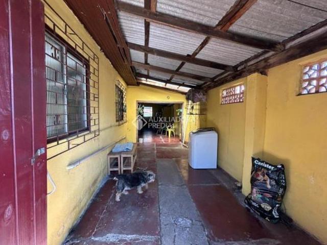 Terreno com 2 frentes e 2 casas no bairro São Vicente em Gravataí