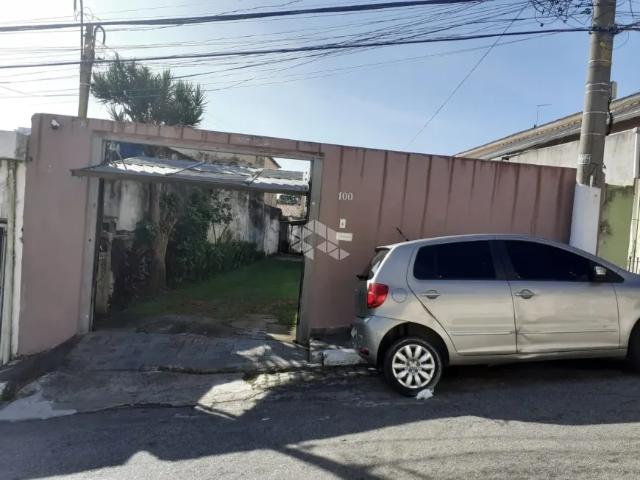 Terreno com 3 casas na Parada Inglesa