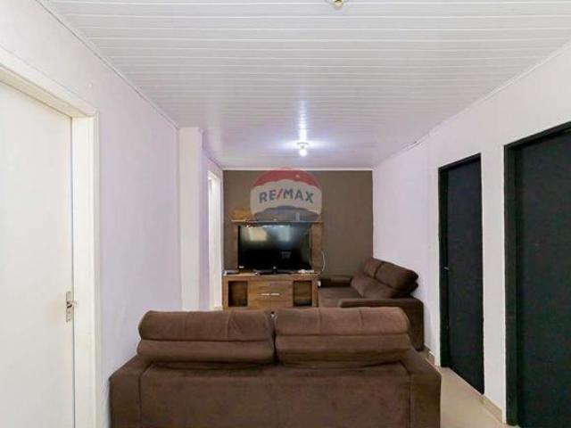Terreno com 3 Casas no Capão Raso: Preço Reduzido Imperdível!