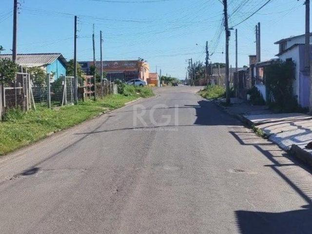Terreno com 3 casas no pátio bairro São Francisco TRAMANDAÌ/RS