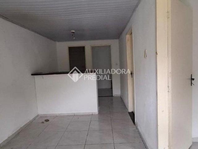 terreno com 3 casas de alvenaria em Itapuã Viamão