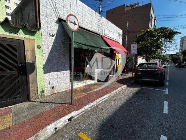 Terreno com 3 casas e 2 comércios à venda!