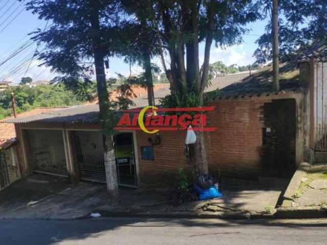 Terreno com 3 casas próximo ao Centro de Arujá