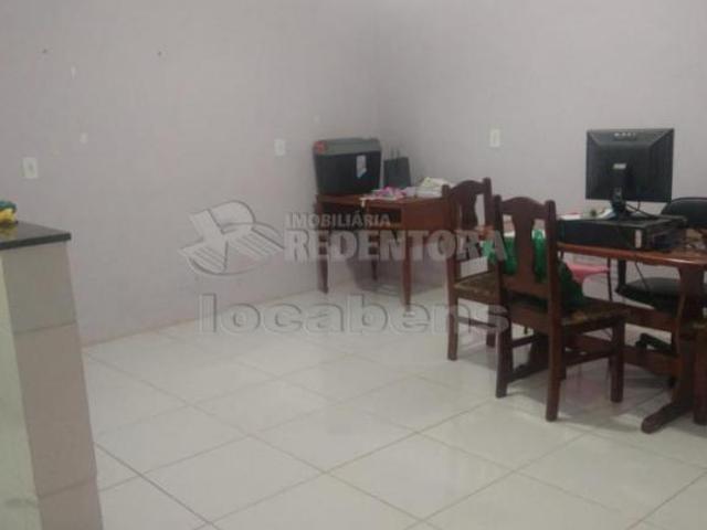 Terreno com 3 casas Vila Ideal