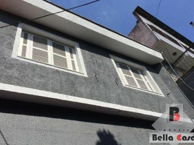 Terreno com 3 casas
