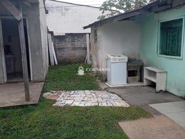 Terreno com 3 imóveis em Ipanema