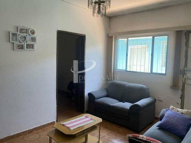 Terreno com três casas em São Miguel Paulista